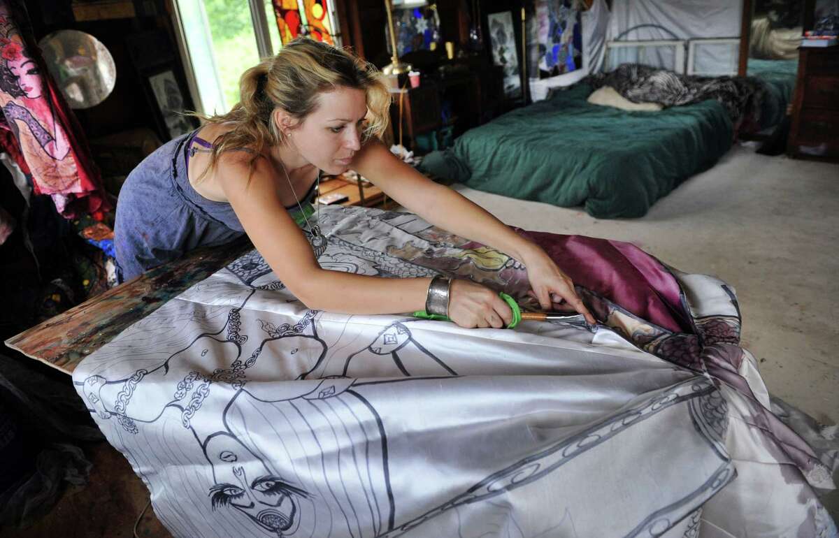 Artist uses dresses as her canvas