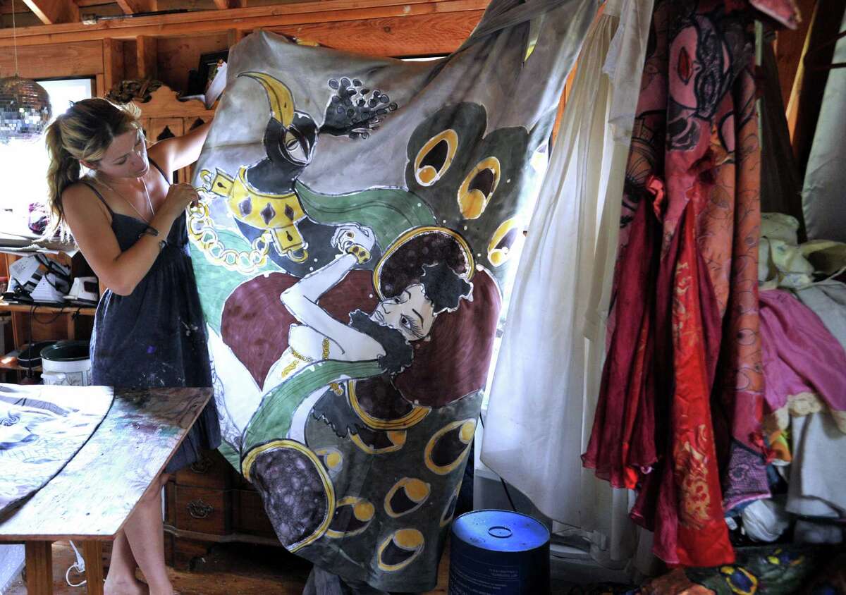 Artist uses dresses as her canvas