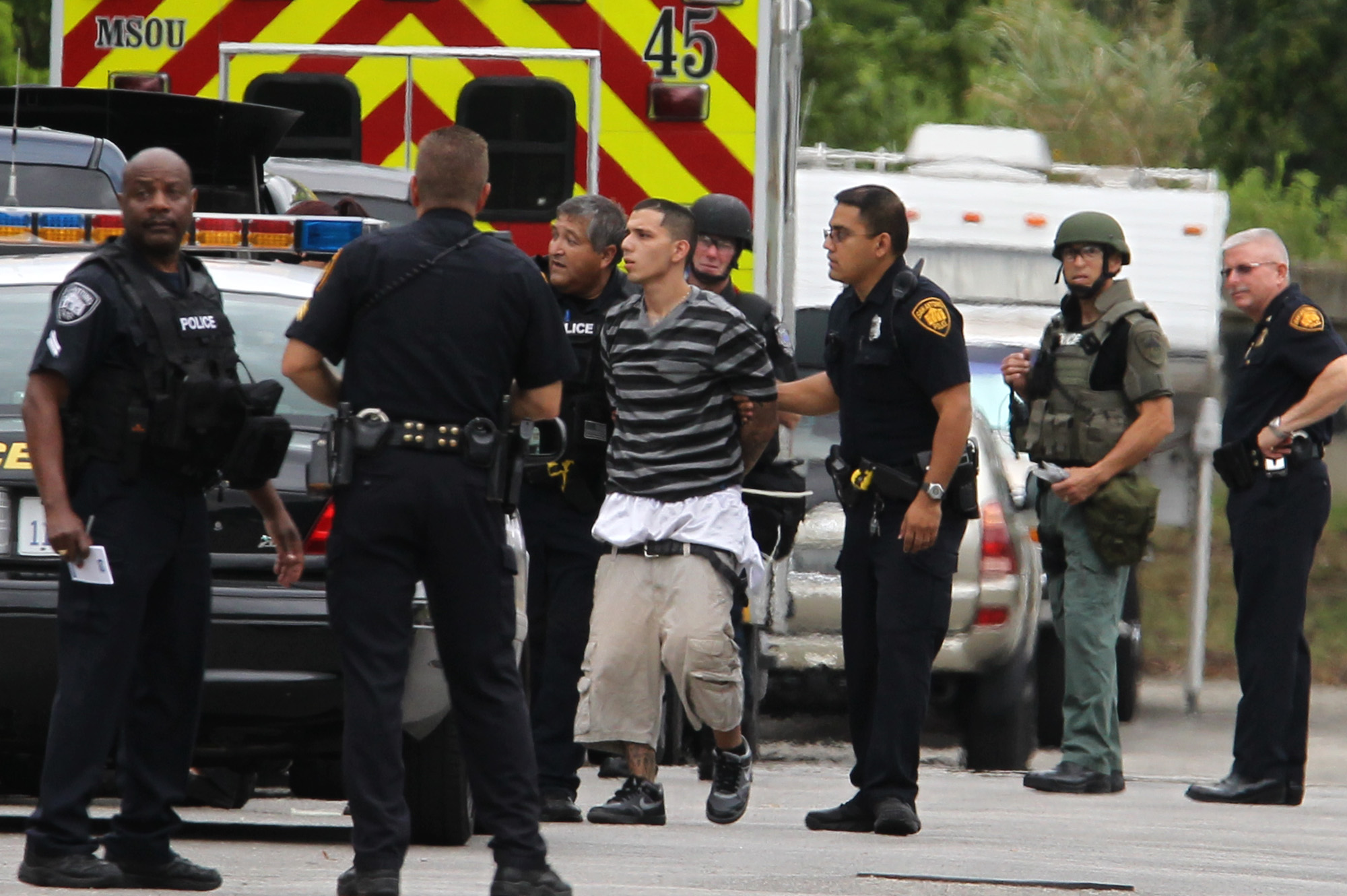 10 detained after armed home invasion, standoff