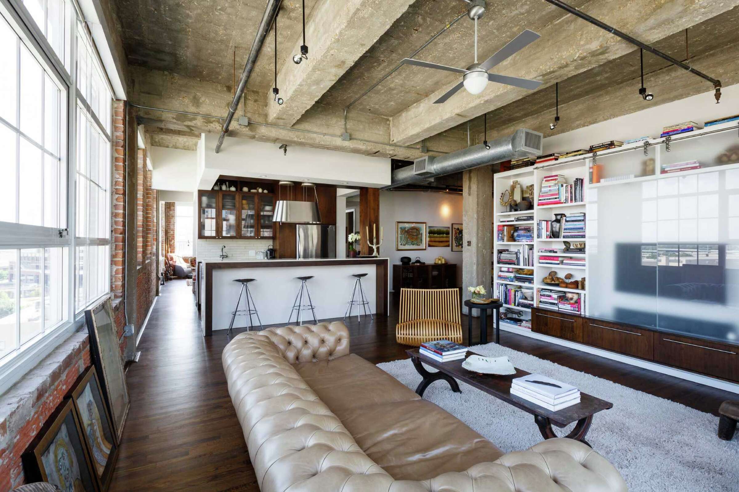 Art, modern furniture shine in a civil rights lawyer's Hermann Lofts abode