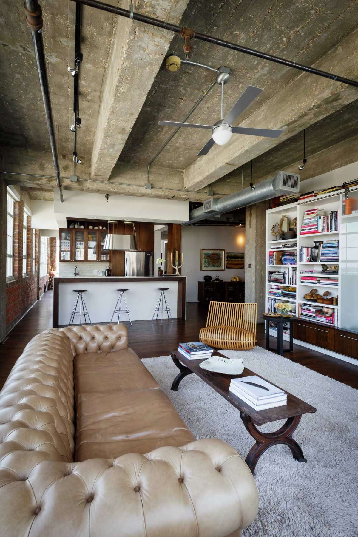 Art, modern furniture shine in a civil rights lawyer's Hermann Lofts abode