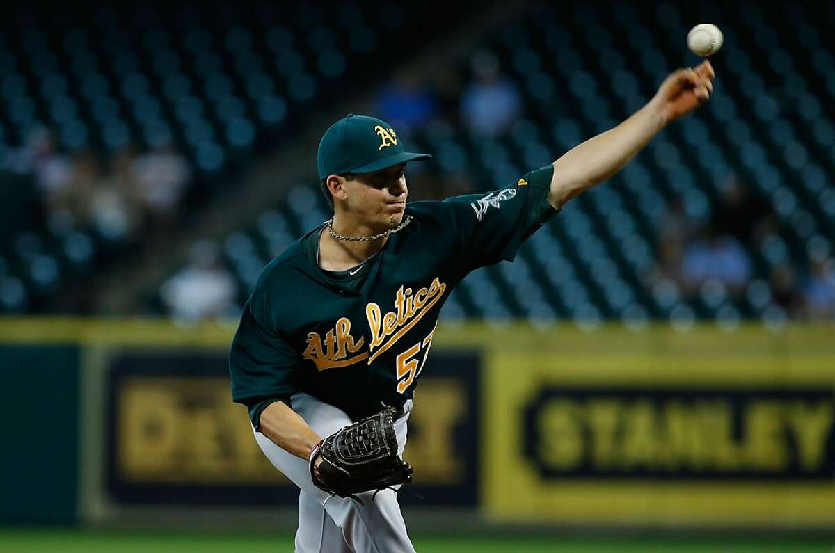 A's nearly give it away, top Astros, 4-3