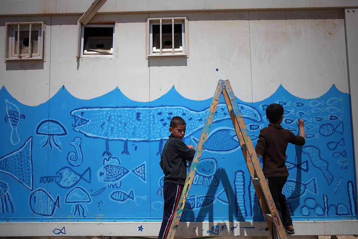 Syrian refugee kids using art to brighten camp