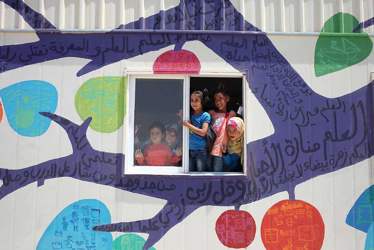 Syrian refugee kids using art to brighten camp