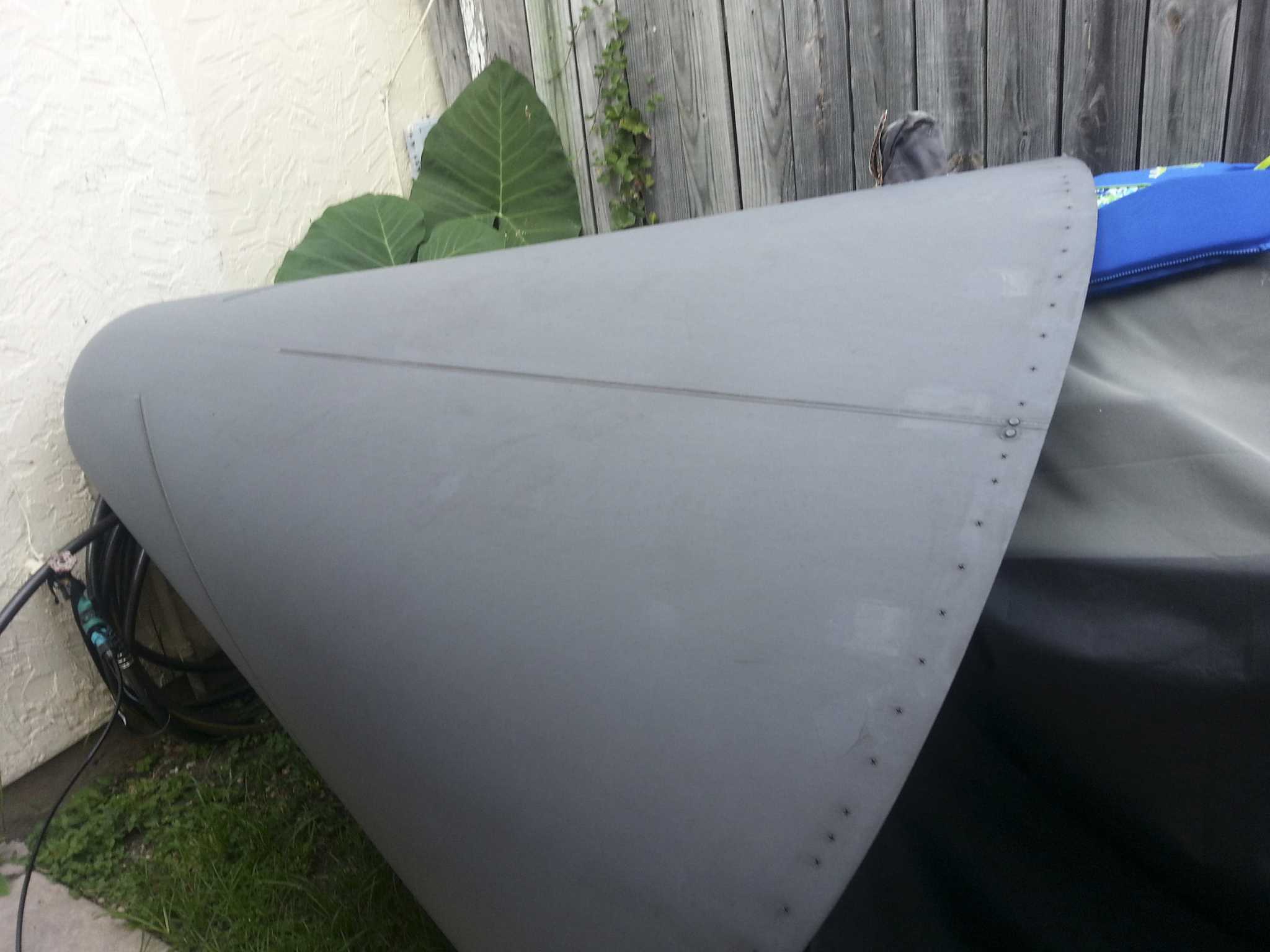 Plane part breaks off, falls in neighborhood
