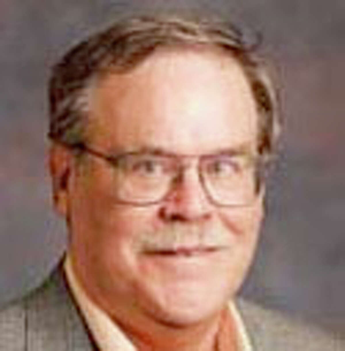 Abbott's role at cancer agency under fire