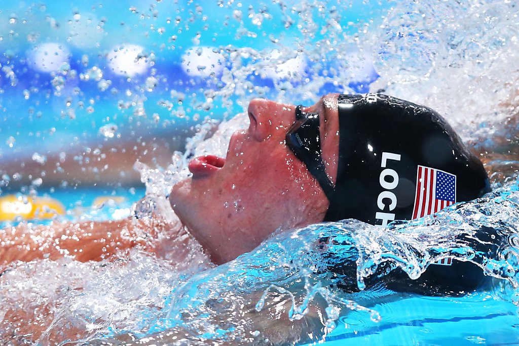 Lochte claims 2 golds on epic night of swimming