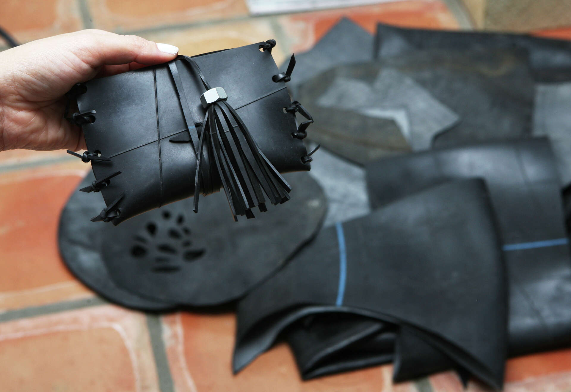 Local designer creates inner tube handbags
