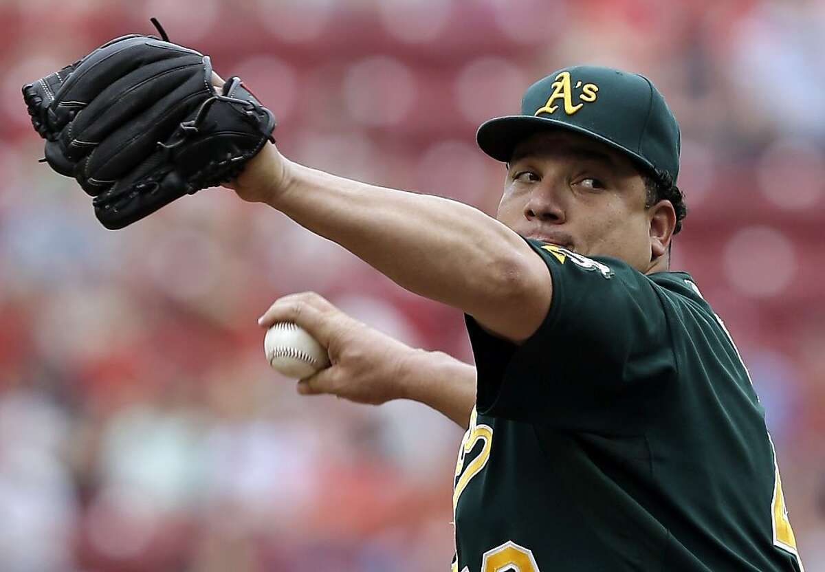 Colon struggles in A's 6-5 loss to Reds