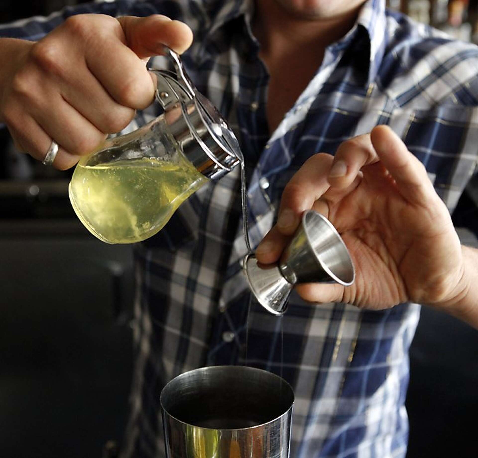 Cocktails take a seat at ever-finer tables