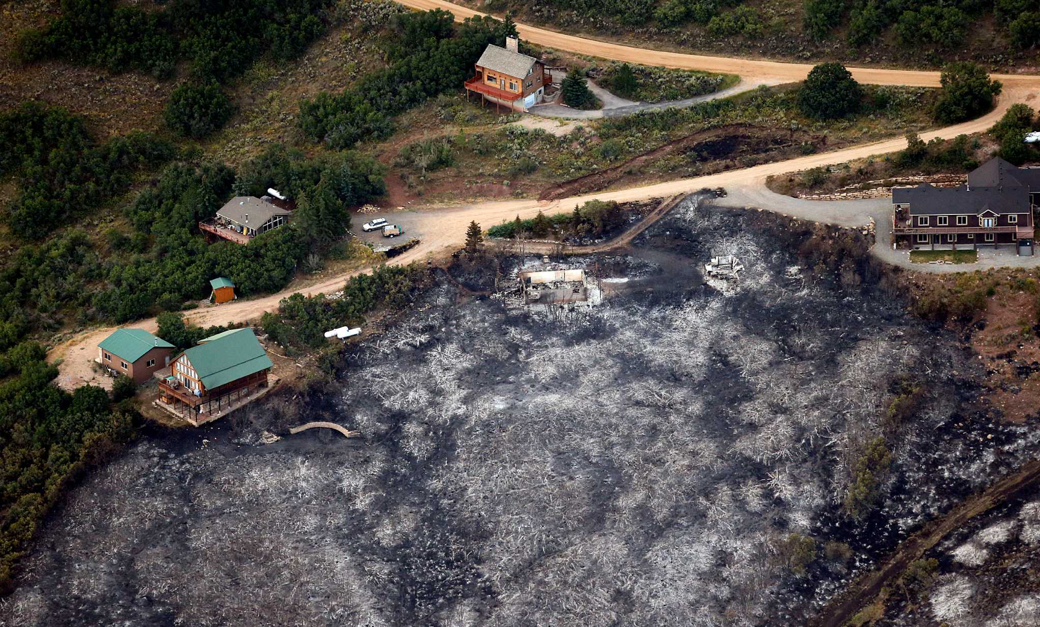 Utah fire destroys 13 homes near resort town
