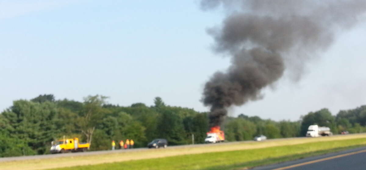 Truck full of copy machines catches fire on I-90