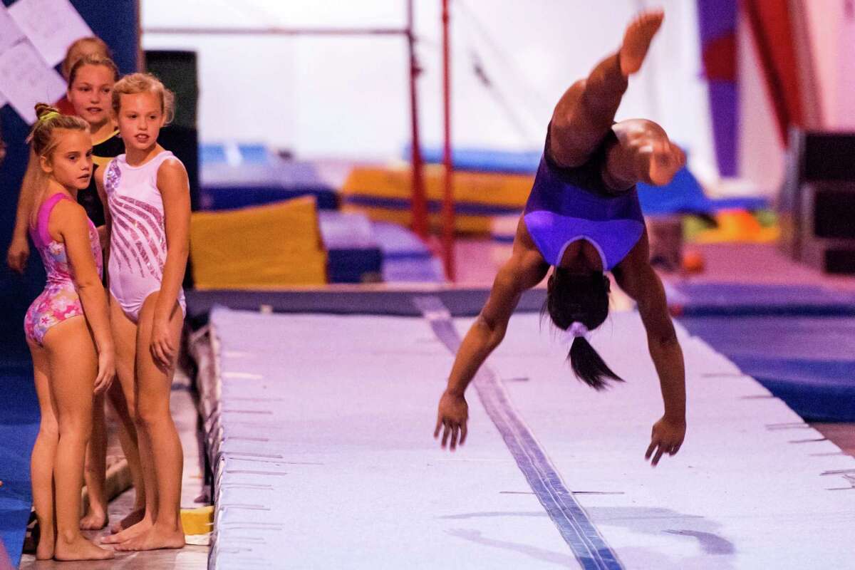 Biles savors national gymnastics title before long lead-up to Olympics