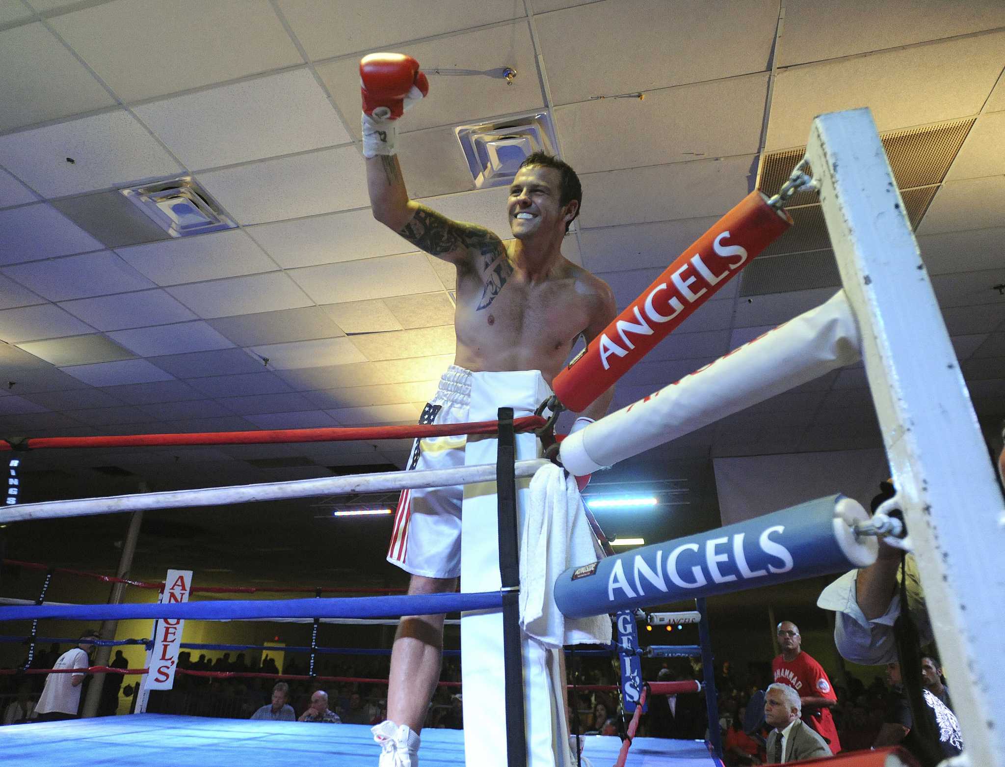 Martinez shakes off jitters, wins pro debut