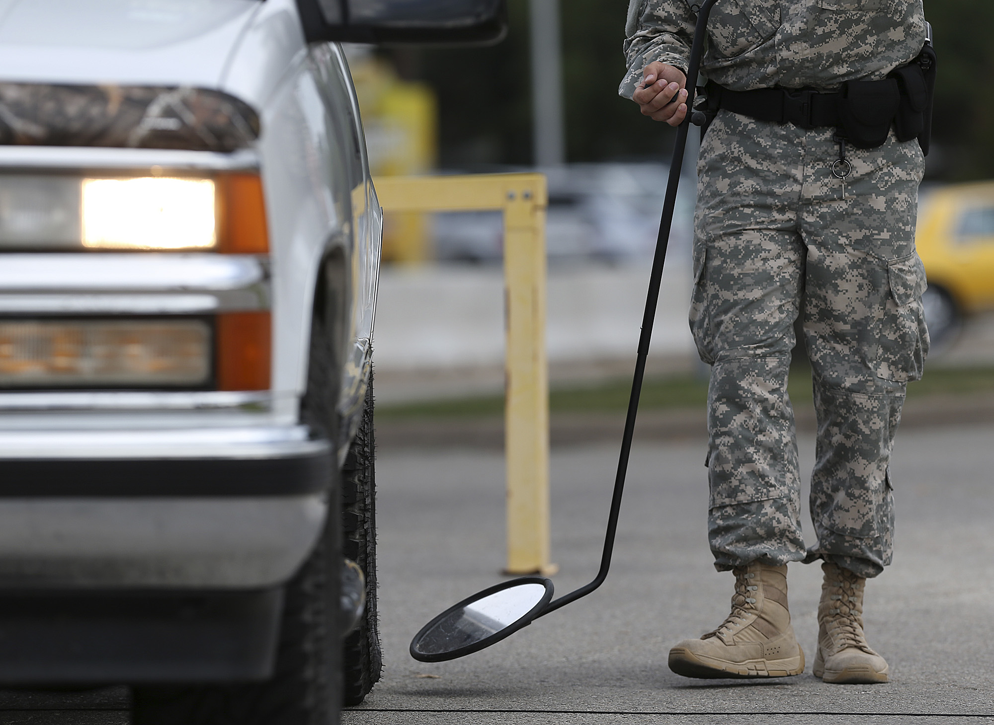 Officer recounts gun battle with Hasan