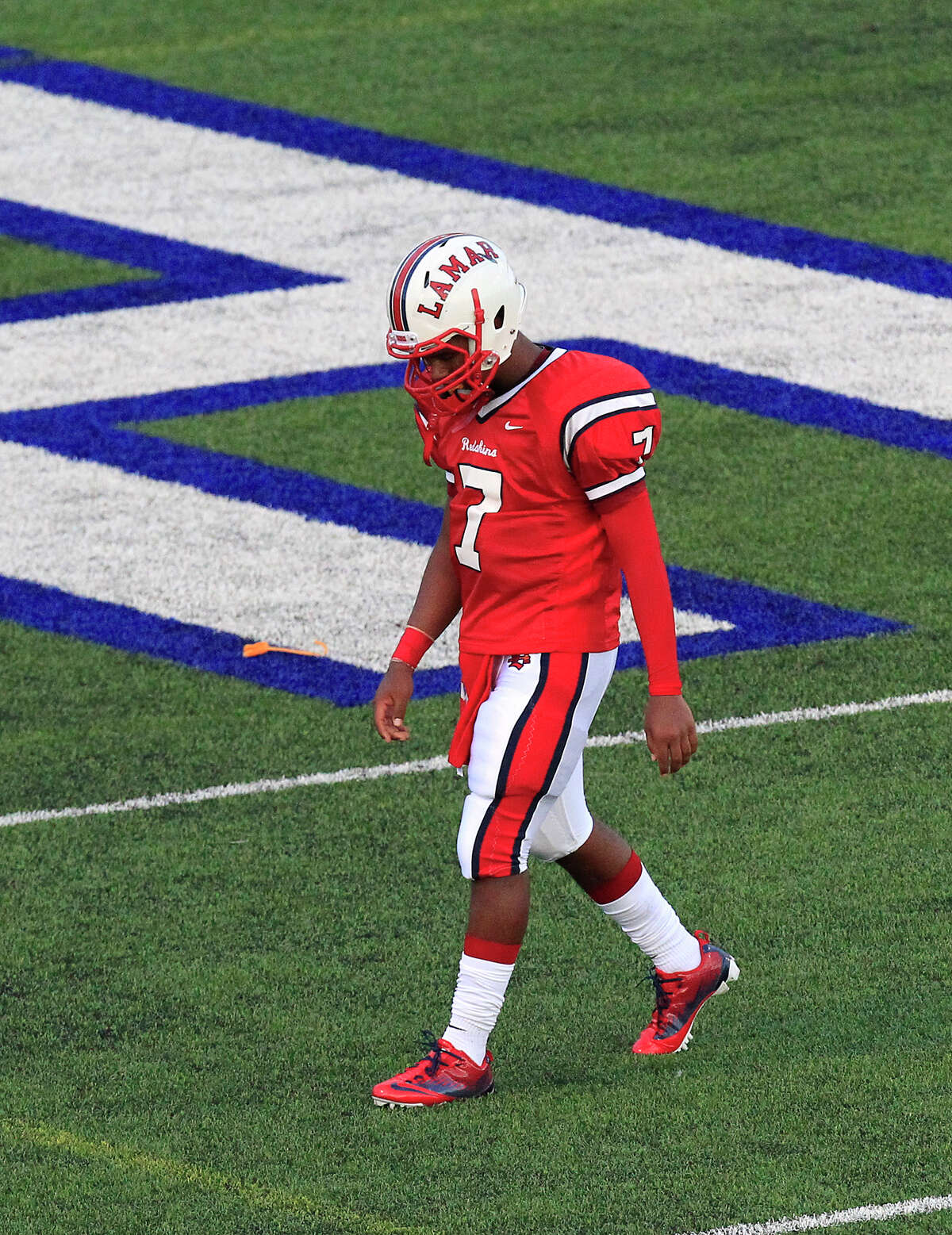 Lamar turns Elkins' mistakes into 38-6 victory