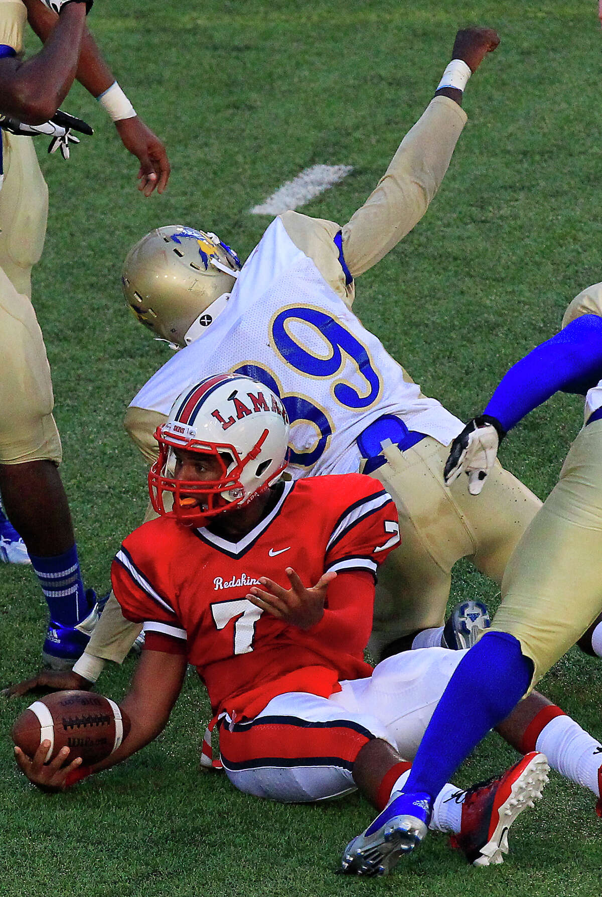 Lamar turns Elkins' mistakes into 38-6 victory