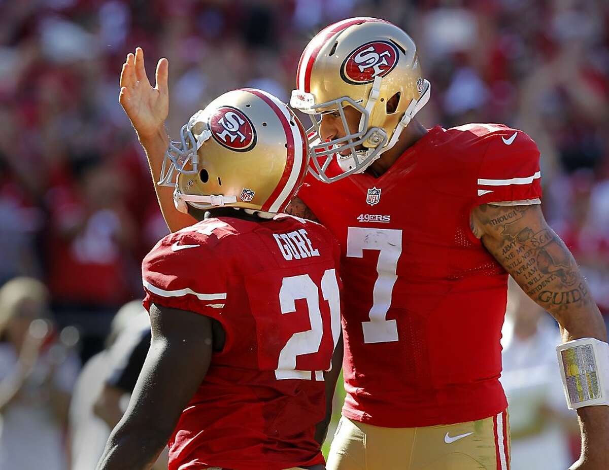 Kaepernick throws for 412 yards in win over Pack