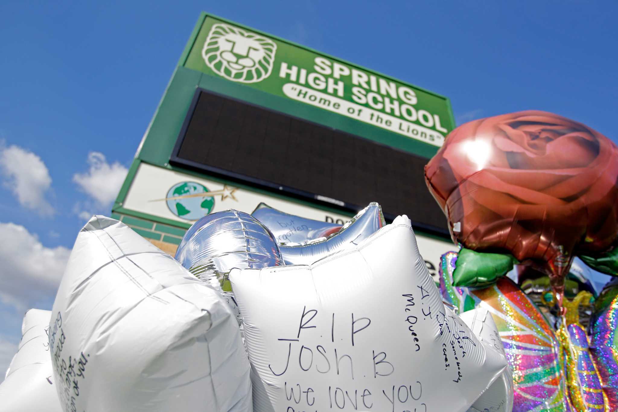 Football team helps Spring begin to heal