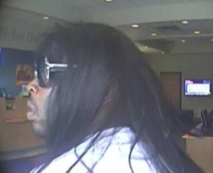 FBI hopes bad wig will ID armed Houston bank robber