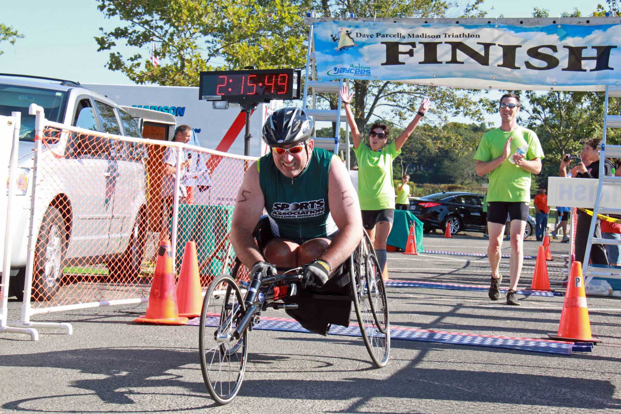 Against all odds: Darien man completes first triathlon as a para-athlete