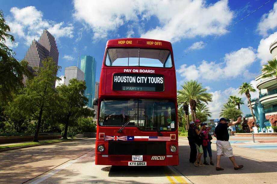 What the heck are those big red tour buses doing in Houston? - Houston ...