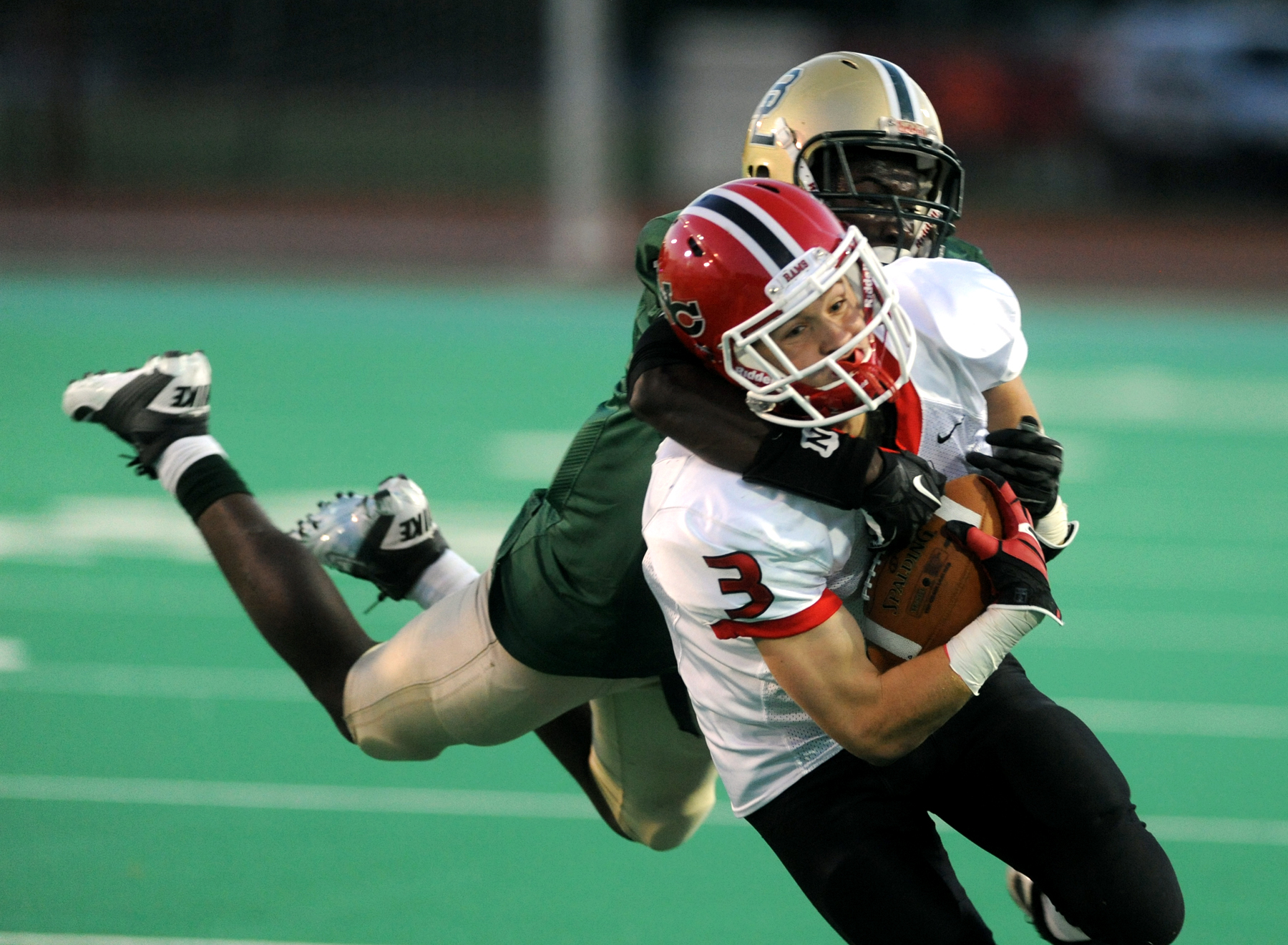 New Canaan football routs Bassick