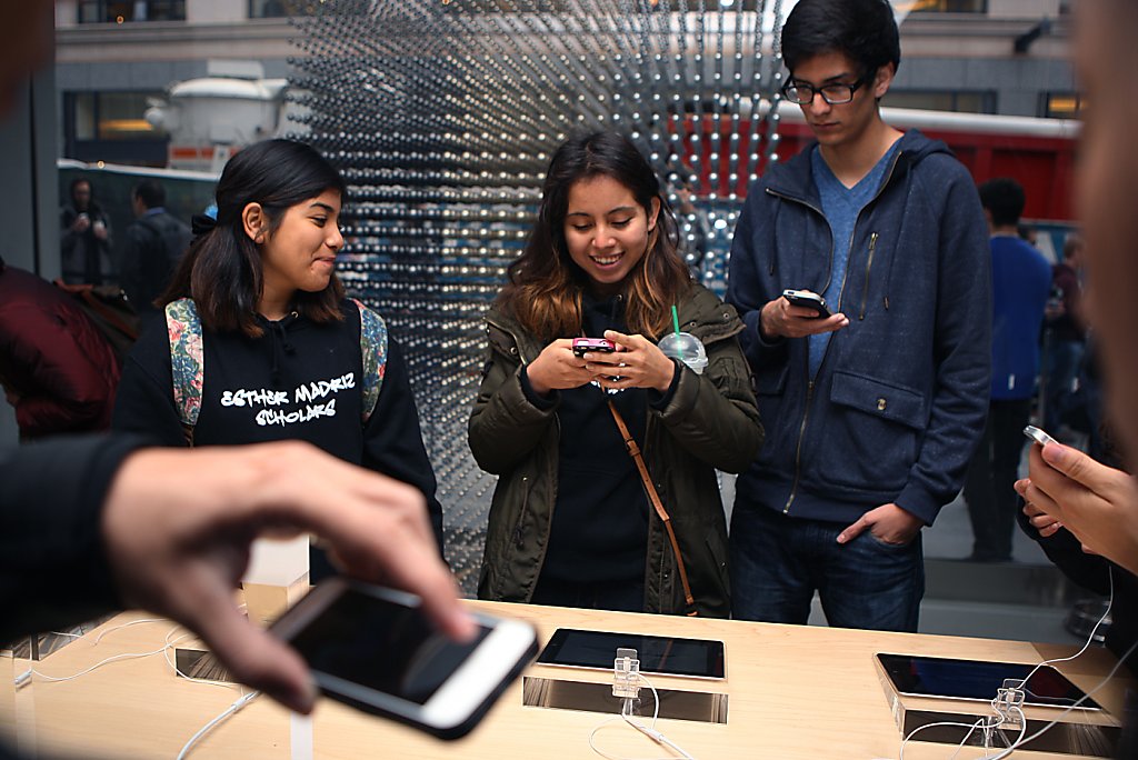 Apple fans line up for new iPhone