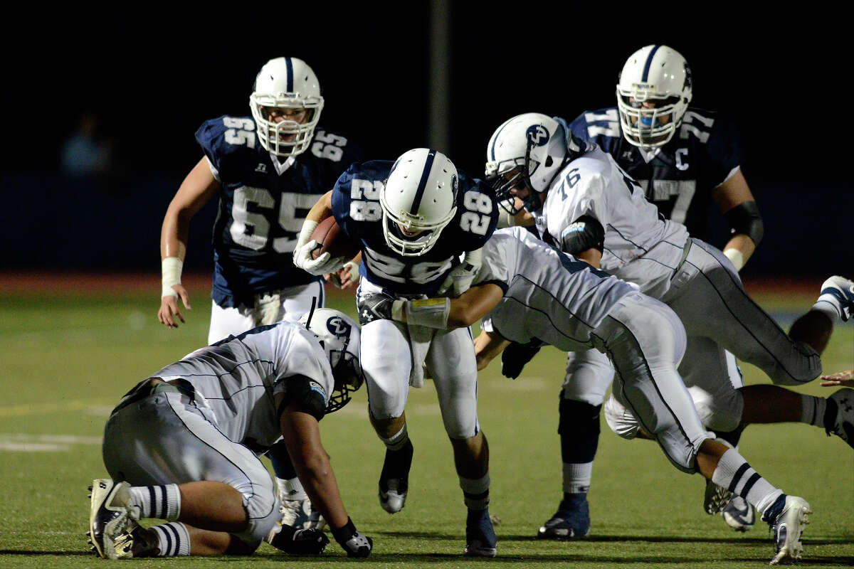 Staples football holds off Wilton