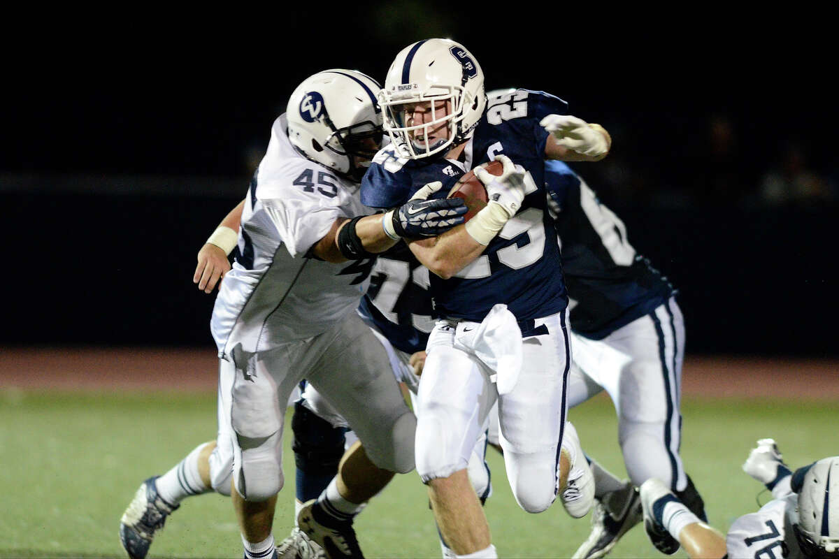 Staples football holds off Wilton