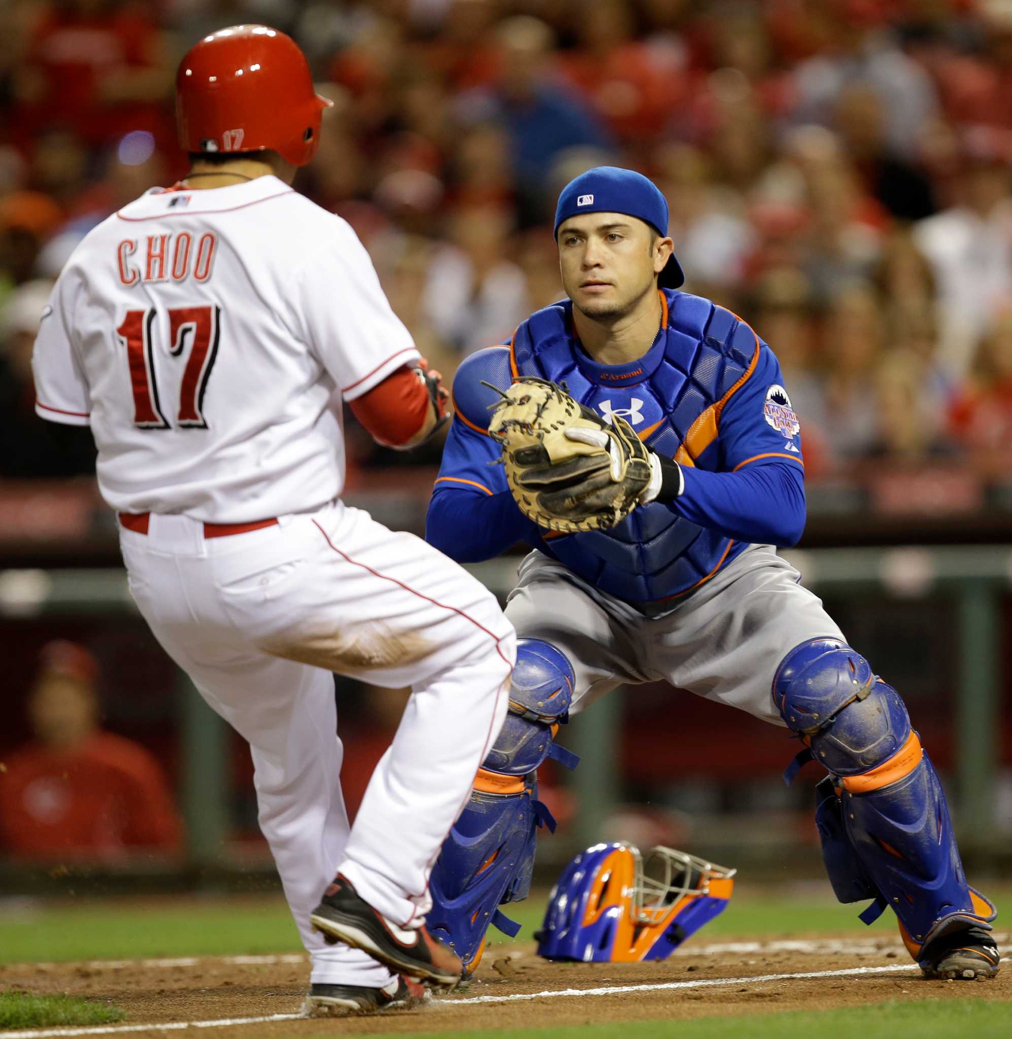 Mets push Reds into postseason