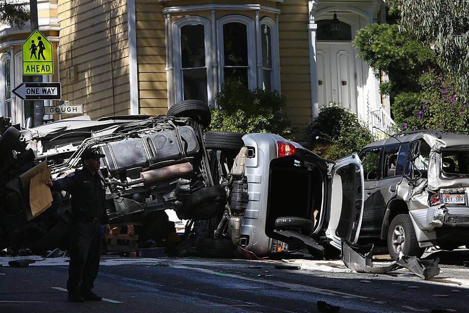 Woman arrested after car hits minivan, killing boy - SFGate