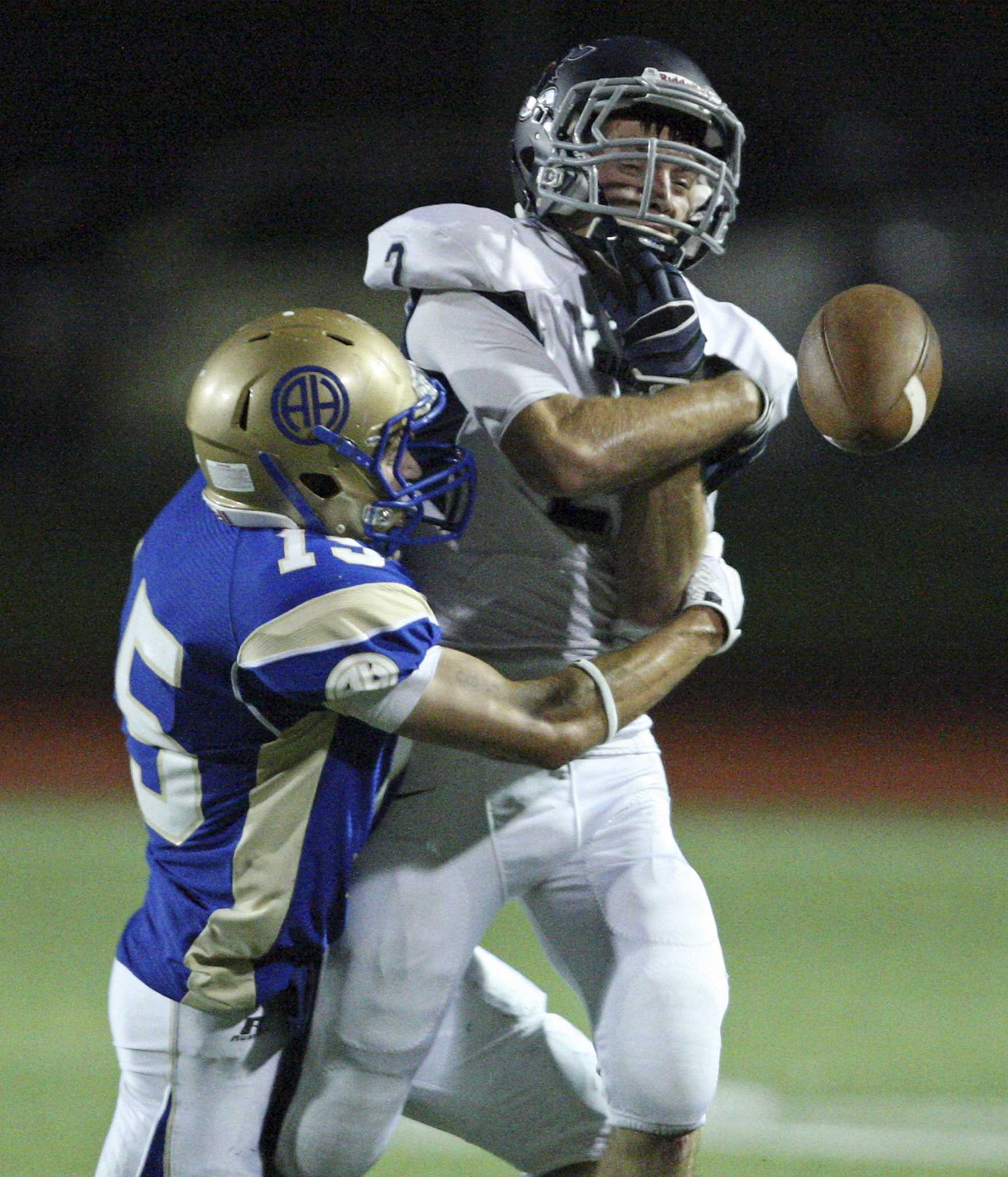 Heights defense seizes control, helps trip Champion