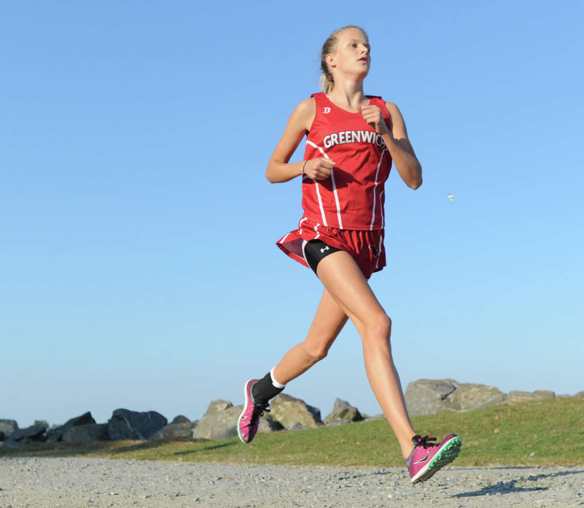 Greenwich High girls cross country running past the opposition