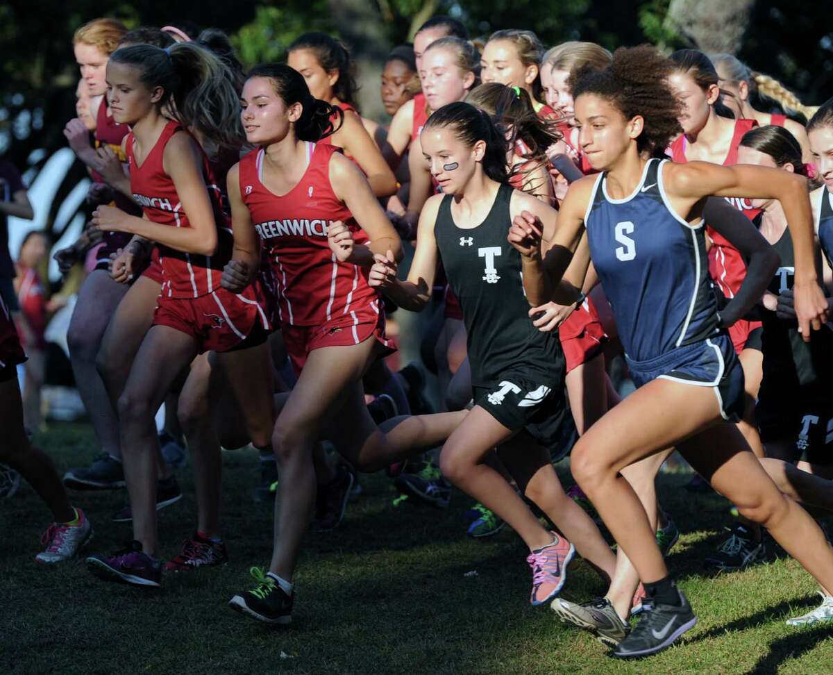 Greenwich High girls cross country running past the opposition
