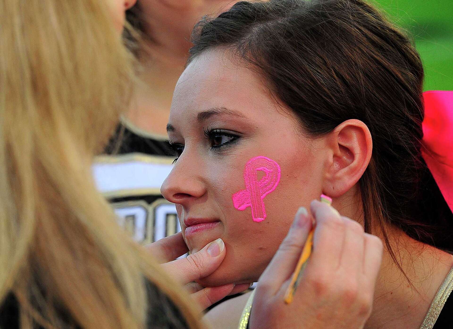 Pink gear for athletes is now cool to wear, also has significance