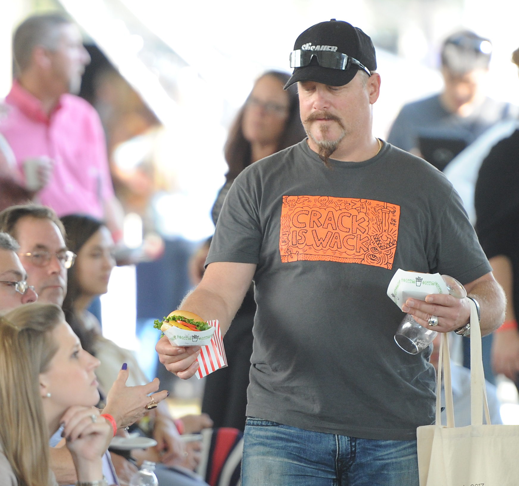 Simpson and Ross engaged in conversation at JHouse