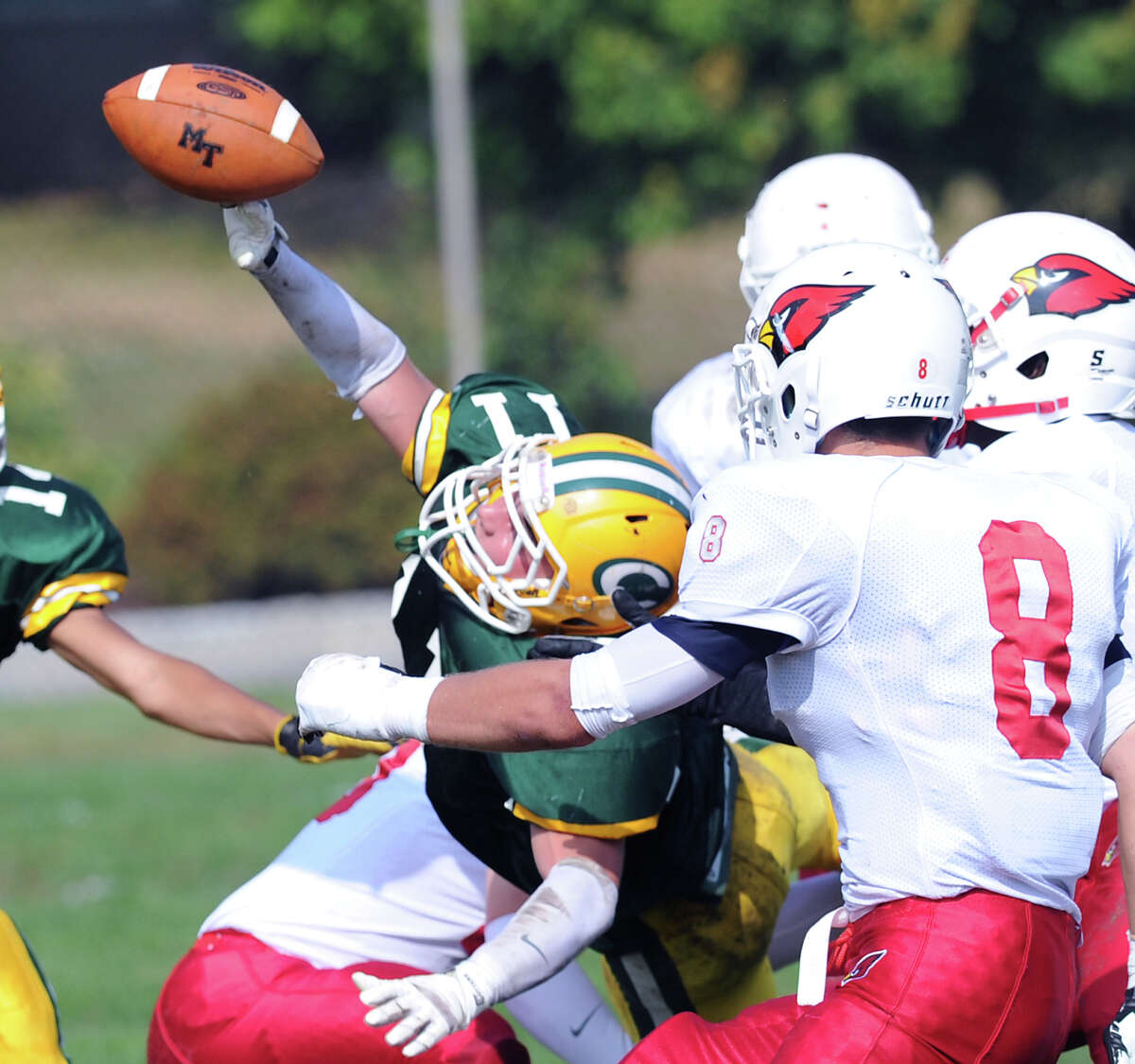 Undefeated Trinity visits winless Greenwich