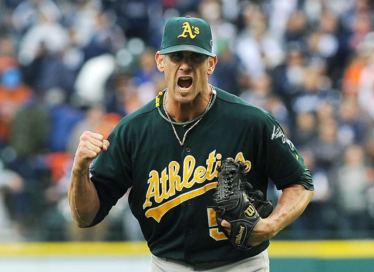 A's pound three homers, beat Tigers 6-3