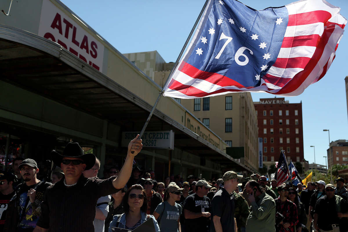Open-carry protestors rally at police substation