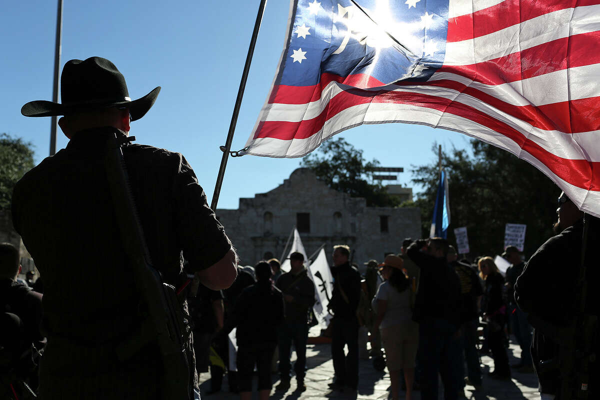 Open-carry protestors rally at police substation