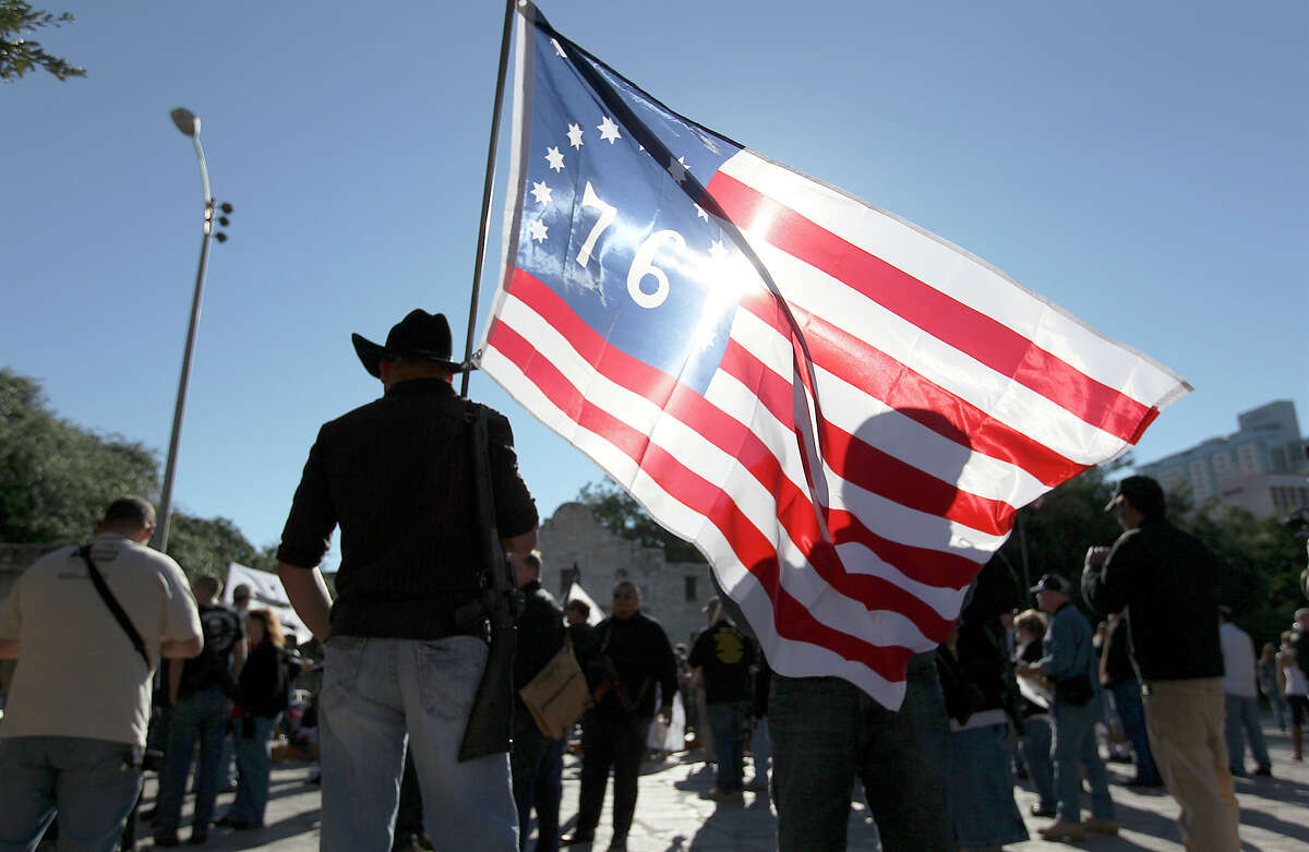 Open-carry protestors rally at police substation