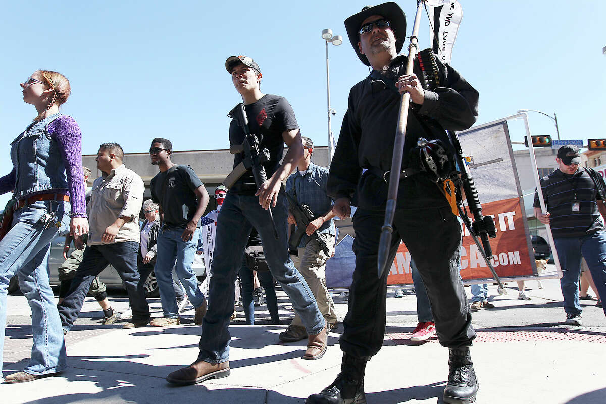 Open-carry protestors rally at police substation