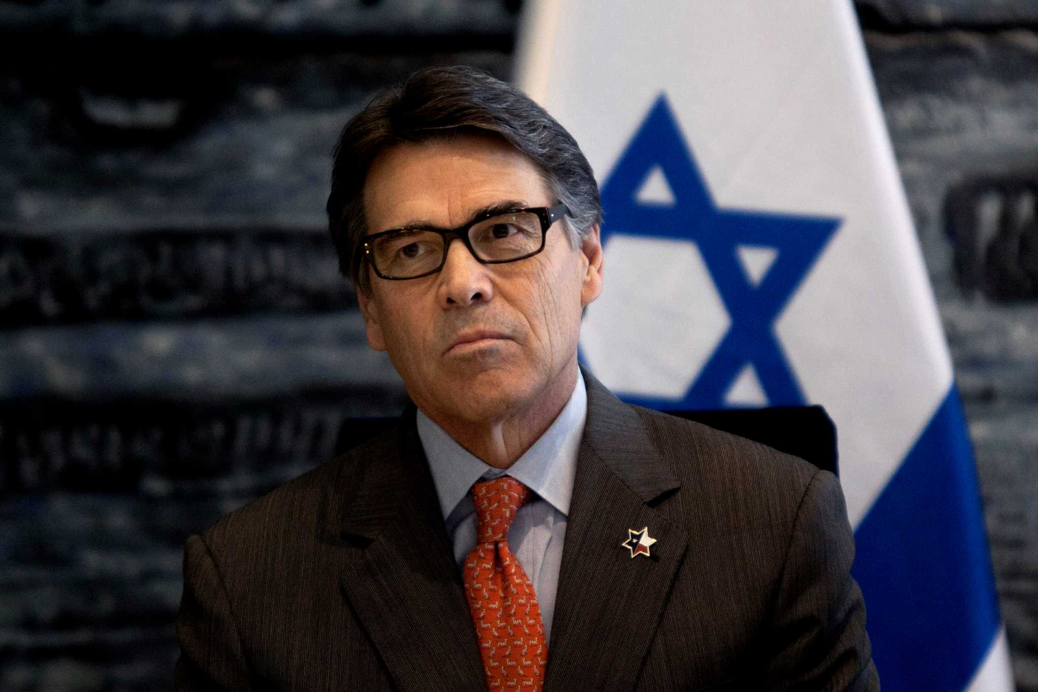 Rick Perry sports new specs and shades of gray