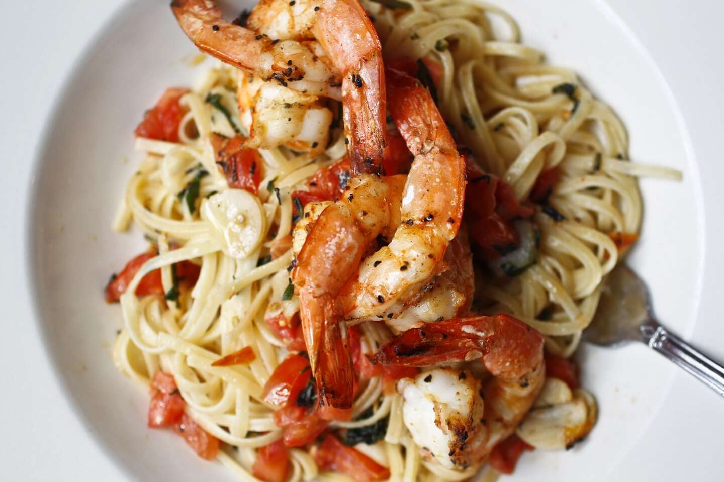 Tony Mandola’s sheds white tablecloth approach