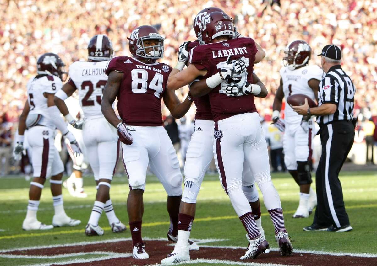 Manziel throws 3 TD passes in A&M's rout of Rice