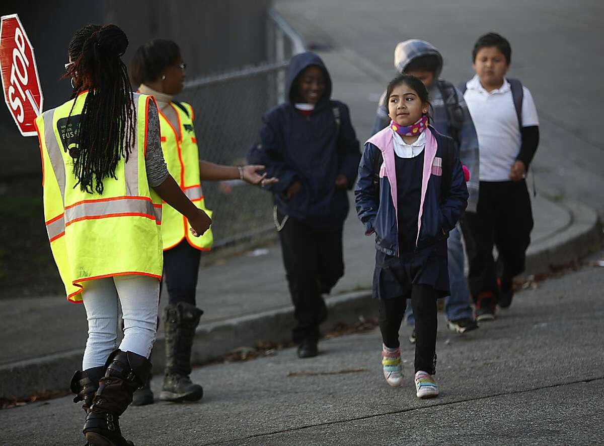 Walking 'school bus' helps put kids on course