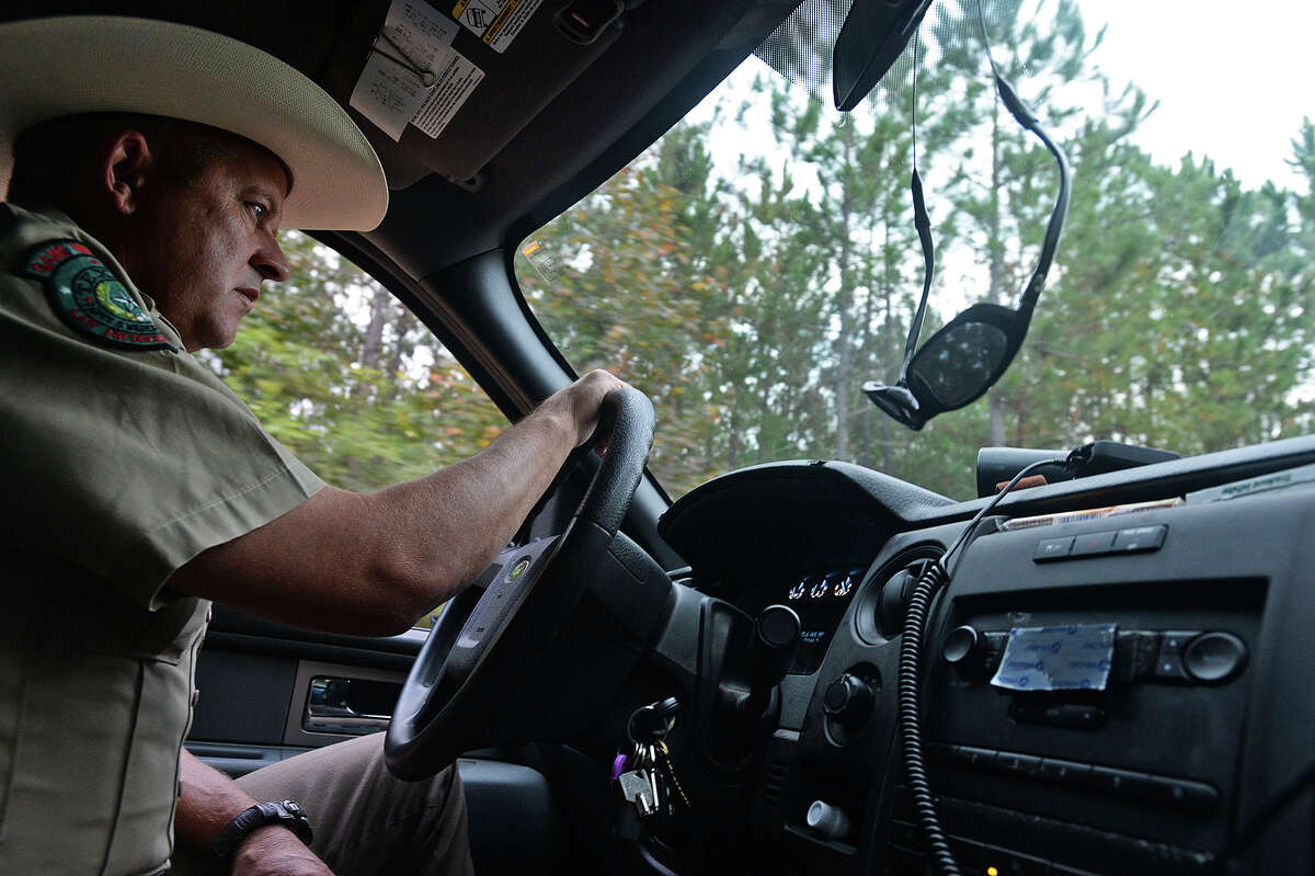 Game warden lives by the law of the wild