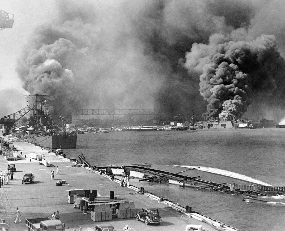 Unforgettable photos captured the attack on Pearl Harbor 76 years ago today