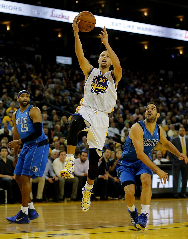 Stephen Curry's shot caps Warriors' rally over Mavs